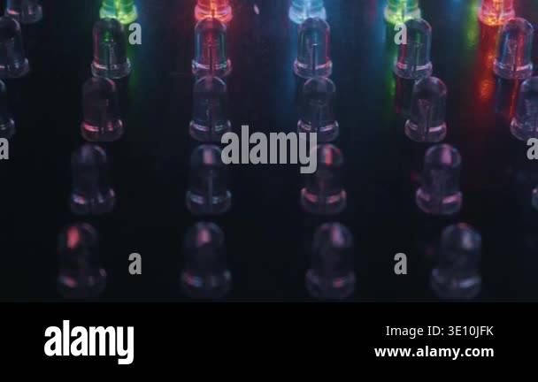 Close up of an RGB LED light panel blinking and flashing in various ...