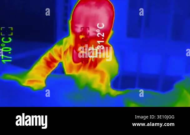 A thermal camera displays the bright heat signature of a crying baby ...