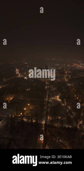 Flying over Krakows Old Town in winter evening, showing Wawel Castle ...