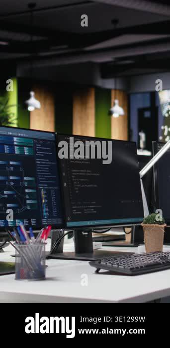 Vertical video Computer in office used to automate app development ...