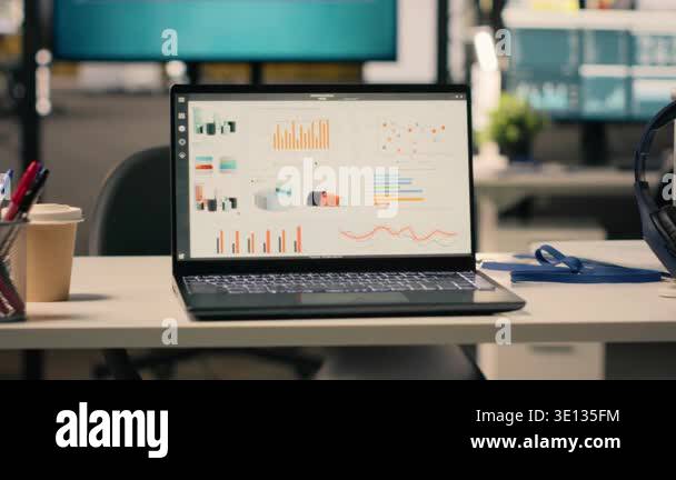 Company data shown on screen in empty executive office space ...
