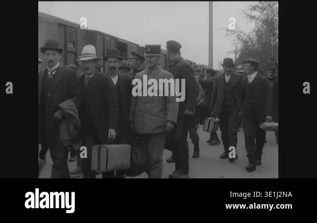 SWEDEN - 1910s - Passengers carry their luggage as they disembark from ...
