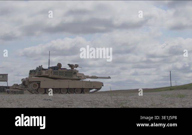 USA - 7.31.2025 - Ground level slow motion view of an M1 Abrams tank ...