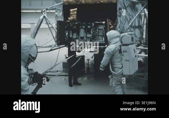 FLORIDA - 1970 - The Apollo 13 astronauts use cables to hoist a box out ...