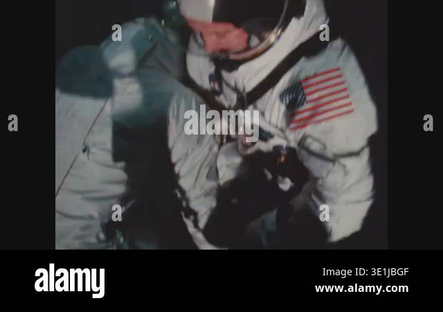 HOUSTON - 1969 - Astronauts in suits assemble a lunar drill during ...