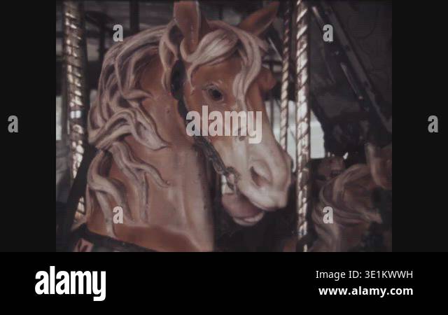 LOS ANGELES - 1970s - Close-ups of carousel horses' heads on the ...