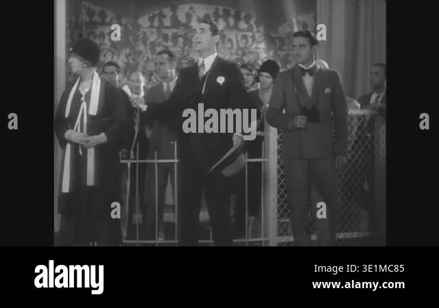 USA - 1930 - In this musical drama, a man sings a song on stage for a ...