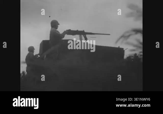 GUAM - 1945 - Soldiers firing machine guns on top of vehicles and use ...