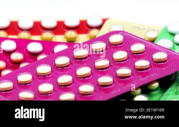 Birth control and family planning concept with colorful contraceptive ...