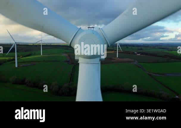 Aerial drone view of wind turbines at Kelmarsh Wind Farm, captured in ...