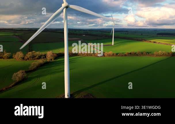 Aerial drone view of wind turbines at Kelmarsh Wind Farm, captured in ...