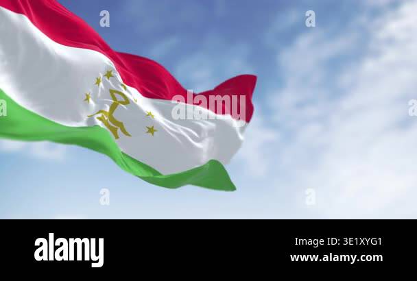 Tajikistan national flag waving. Red-white-green stripes with a central ...