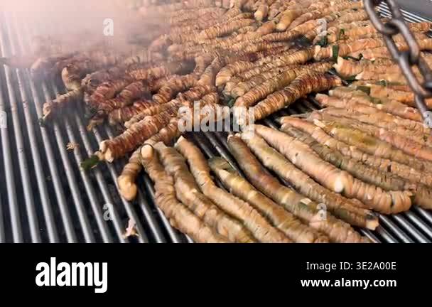 Stigghiola, a typical Palermo street food specialty made with lamb ...