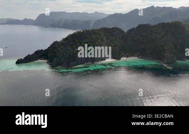 Drone Aerial view of Banol Beach on paradise island, Coron, Palawan ...