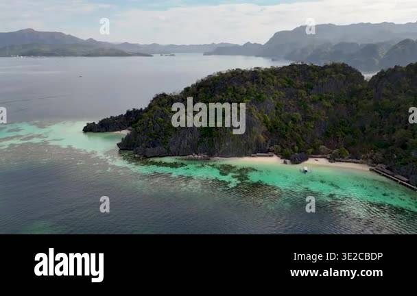 Drone Aerial view of Banol Beach on paradise island, Coron, Palawan ...