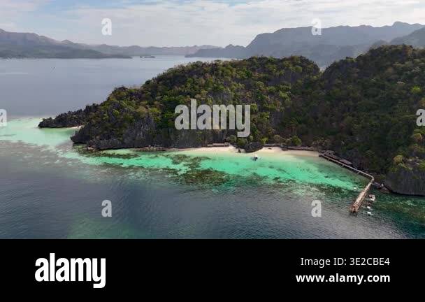 Drone Aerial view of Banol Beach on paradise island, Coron, Palawan ...