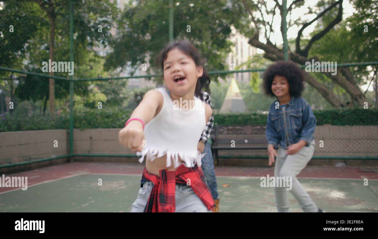 Group of three kids dancing together Stock Video Footage - Alamy