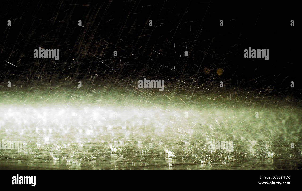 Rain pouring under city lights Stock Video Footage - Alamy