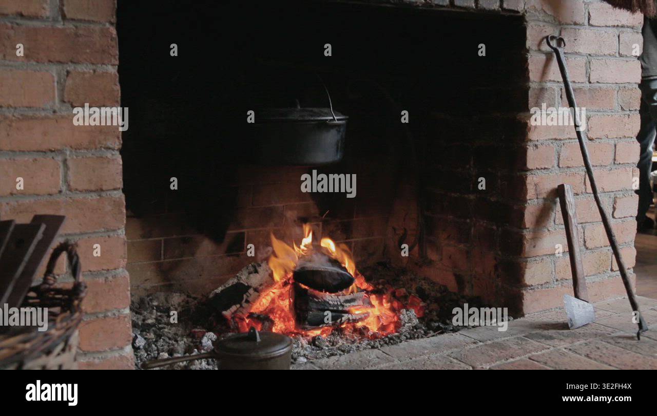 Cooking over an open fire at home Stock Video Footage - Alamy