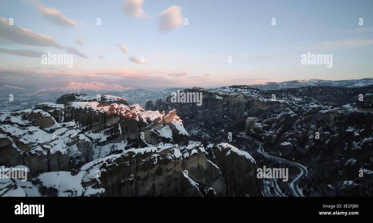 spectacular view of snowcovered rockformations of meteora in winter at ...