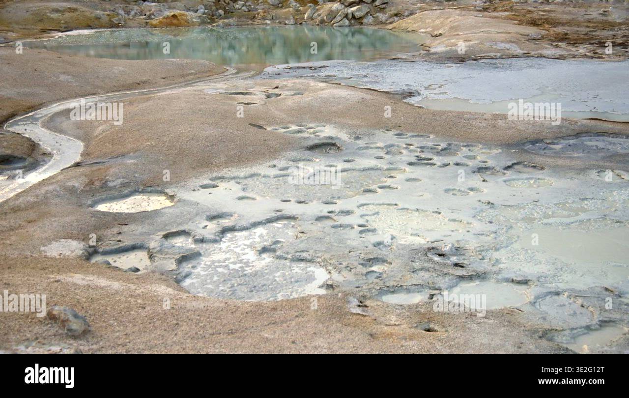 Bubbling Mud Pools at Geothermal Area with Vibrant Hot Springs Stock ...