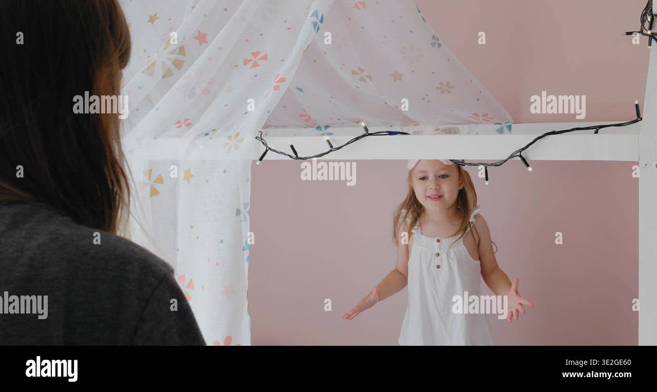 Anonymous mother throwing toy to daughter Stock Video Footage - Alamy