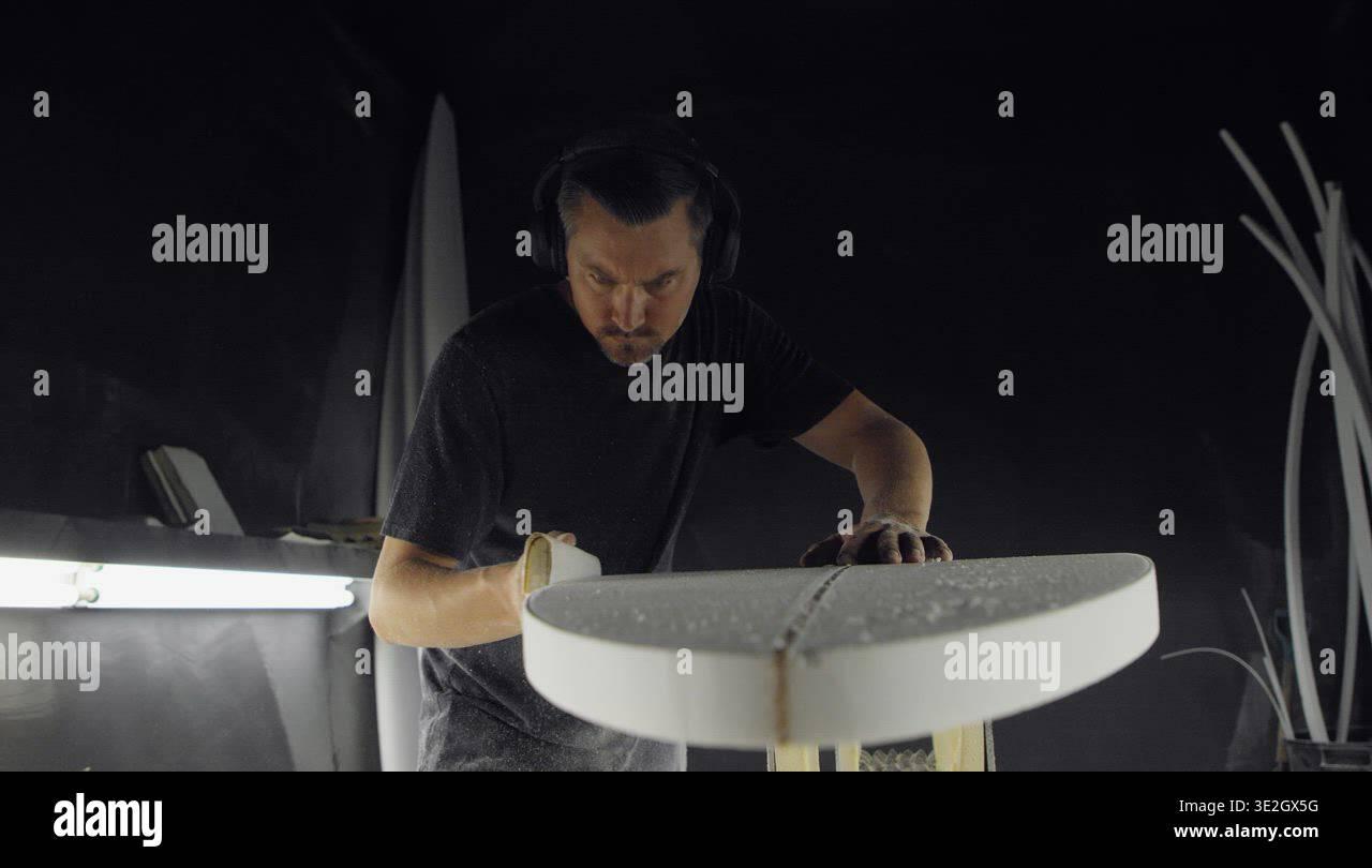 Surfboard Shaper Sanding Surfboard In Studio Stock Video Footage - Alamy