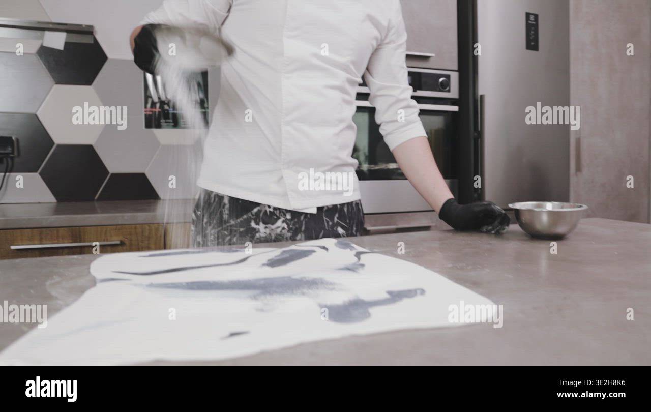 Baker cooking sugar mastic Stock Video Footage - Alamy