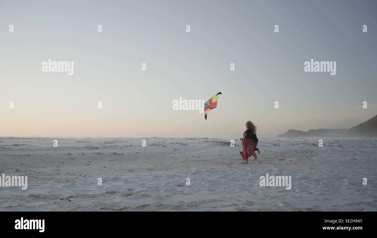 Flying a kite Stock Video Footage - Alamy