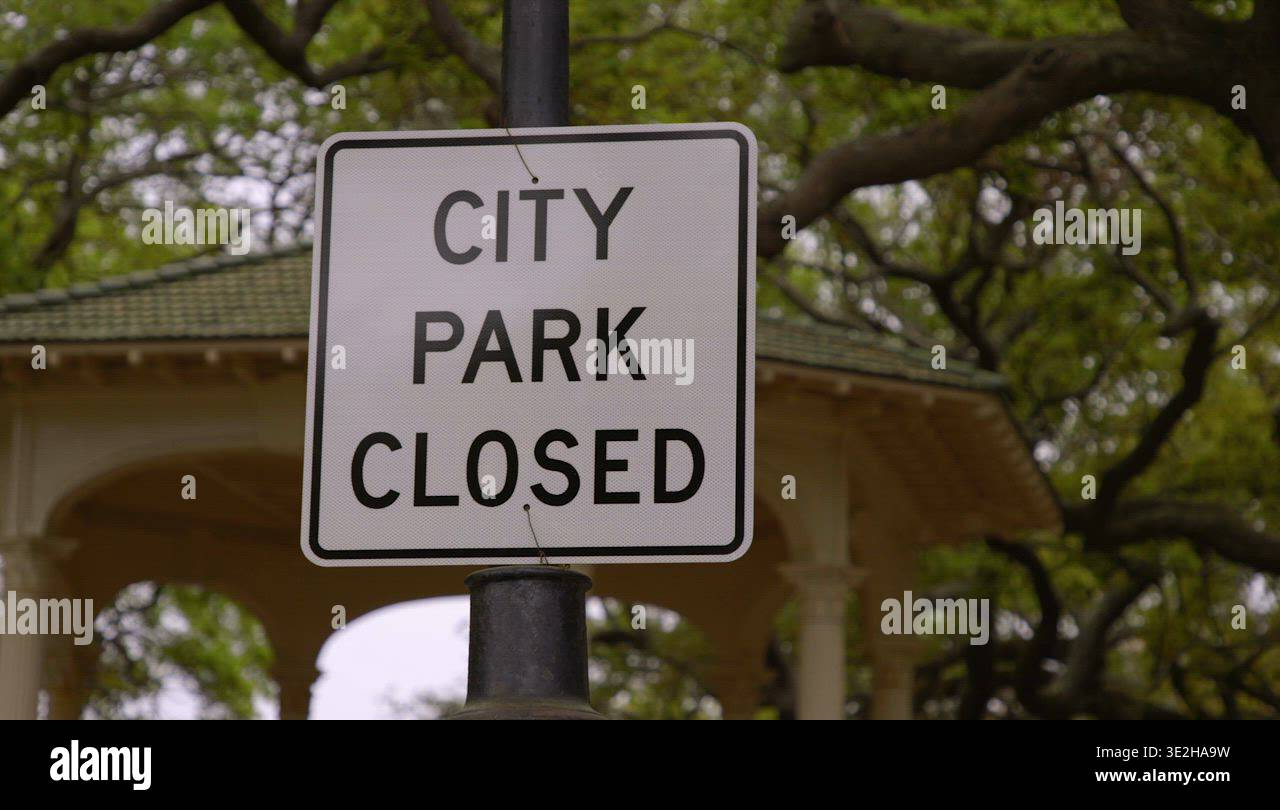 City Park Closed' sign hangs in park Stock Video Footage - Alamy