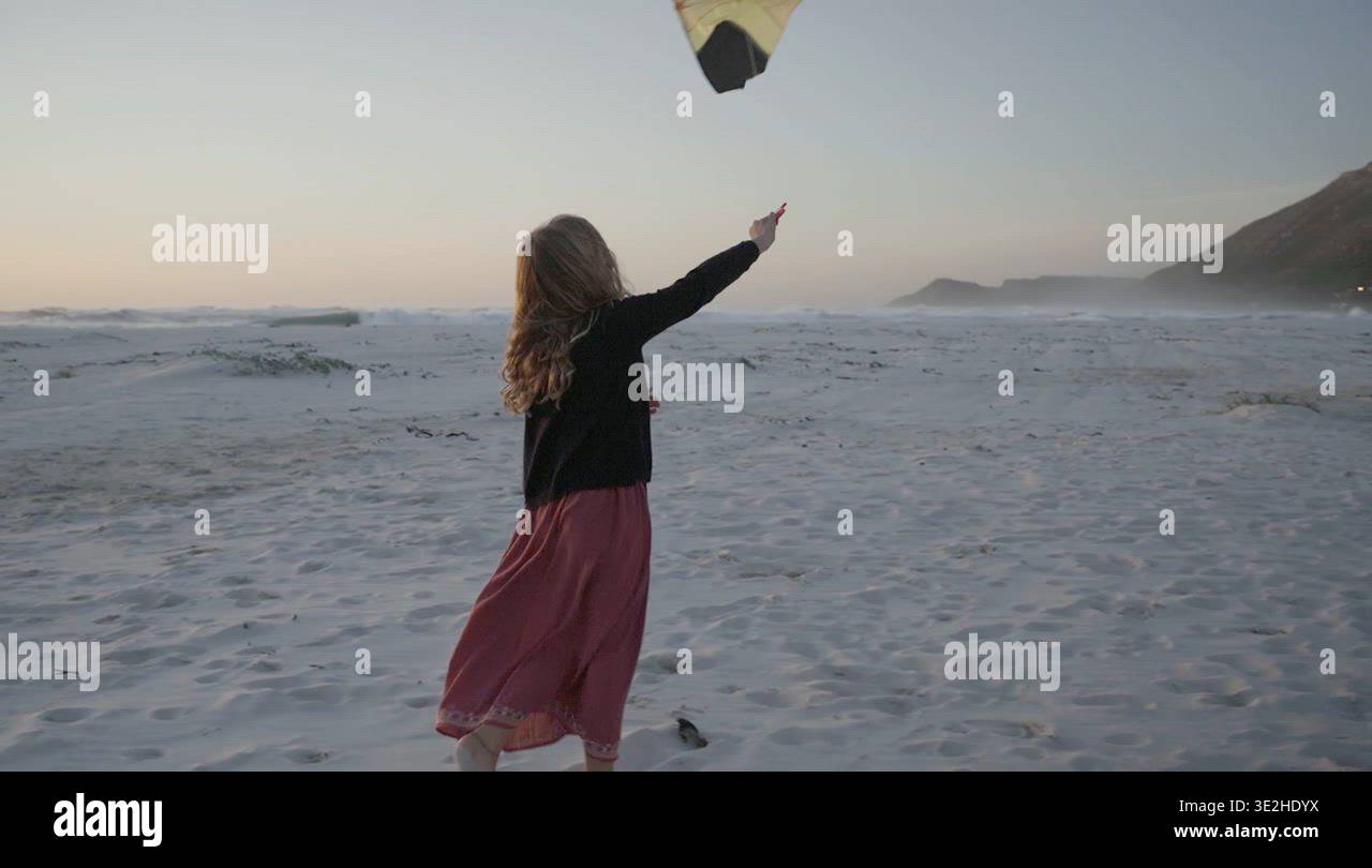 Flying a kite Stock Video Footage - Alamy