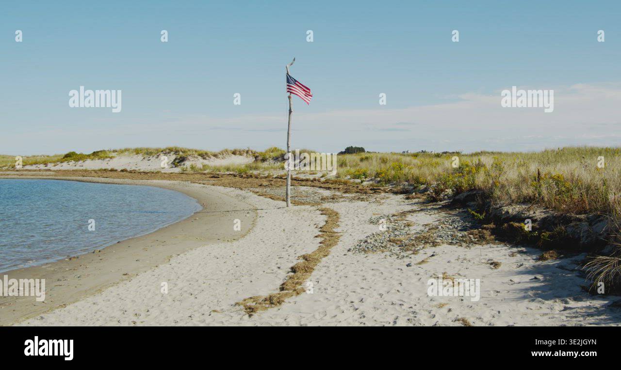 American Flag on Homemade Flagpole at Beach pan video Stock Video ...
