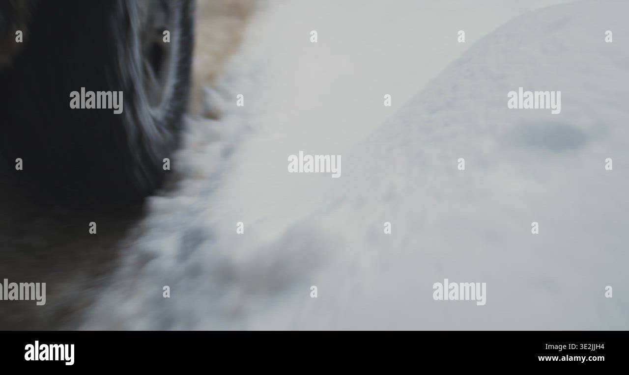 Driving through slushy snow Stock Video Footage - Alamy