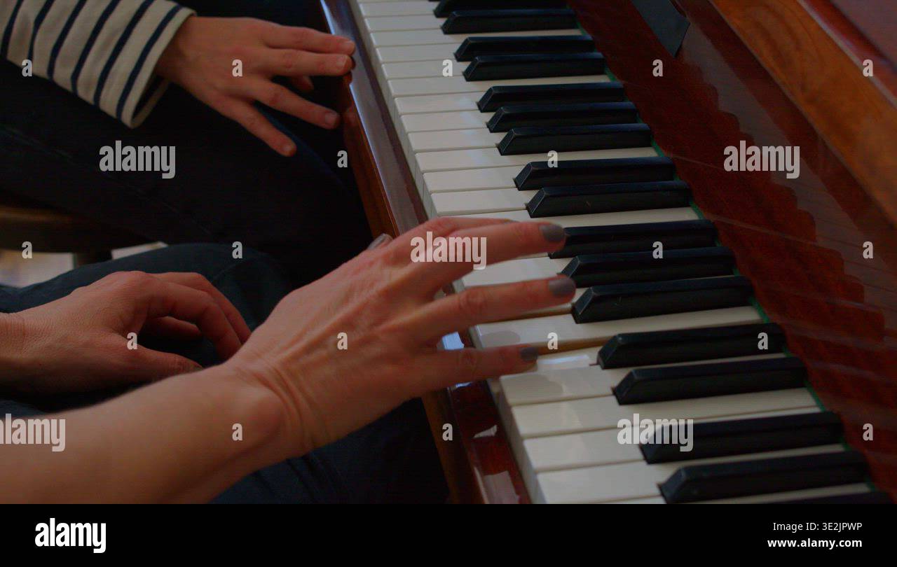 senior elderly woman teacher piano lessons at home Stock Video Footage ...