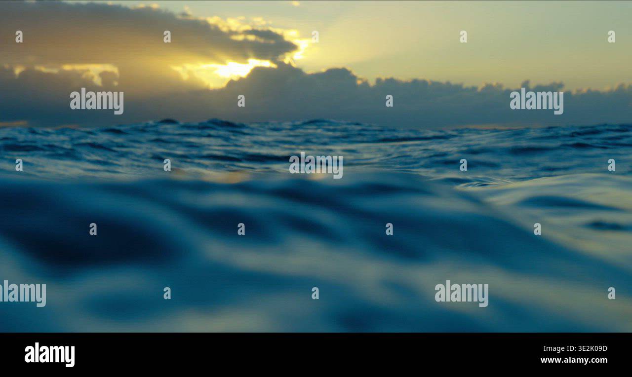 Reflective ocean water surface at sunset Stock Video Footage - Alamy