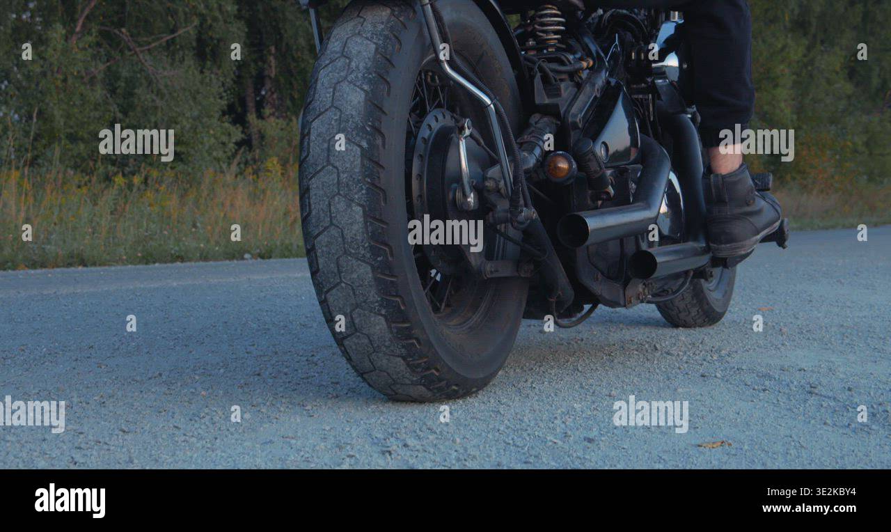 Biker riding chopper motorcycle on road Stock Video Footage - Alamy