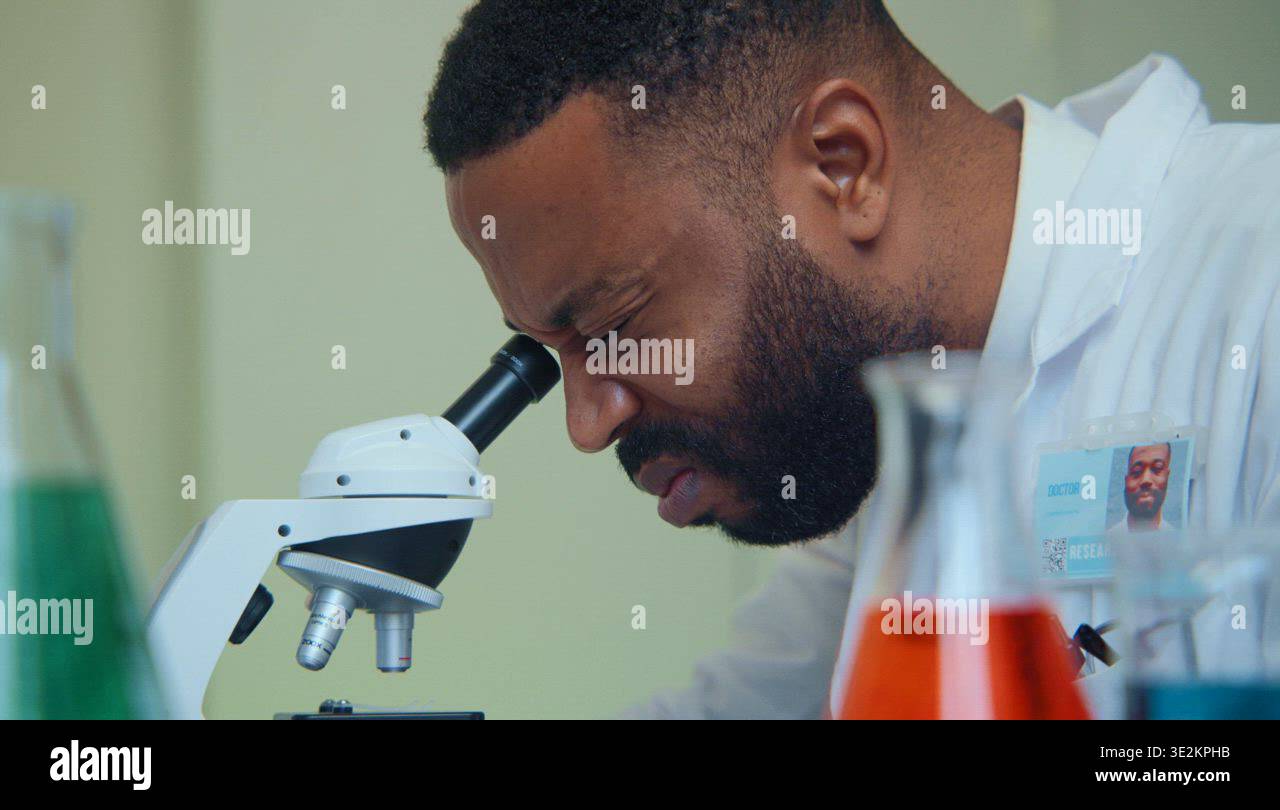 A pathologist using a microscope Stock Video Footage - Alamy