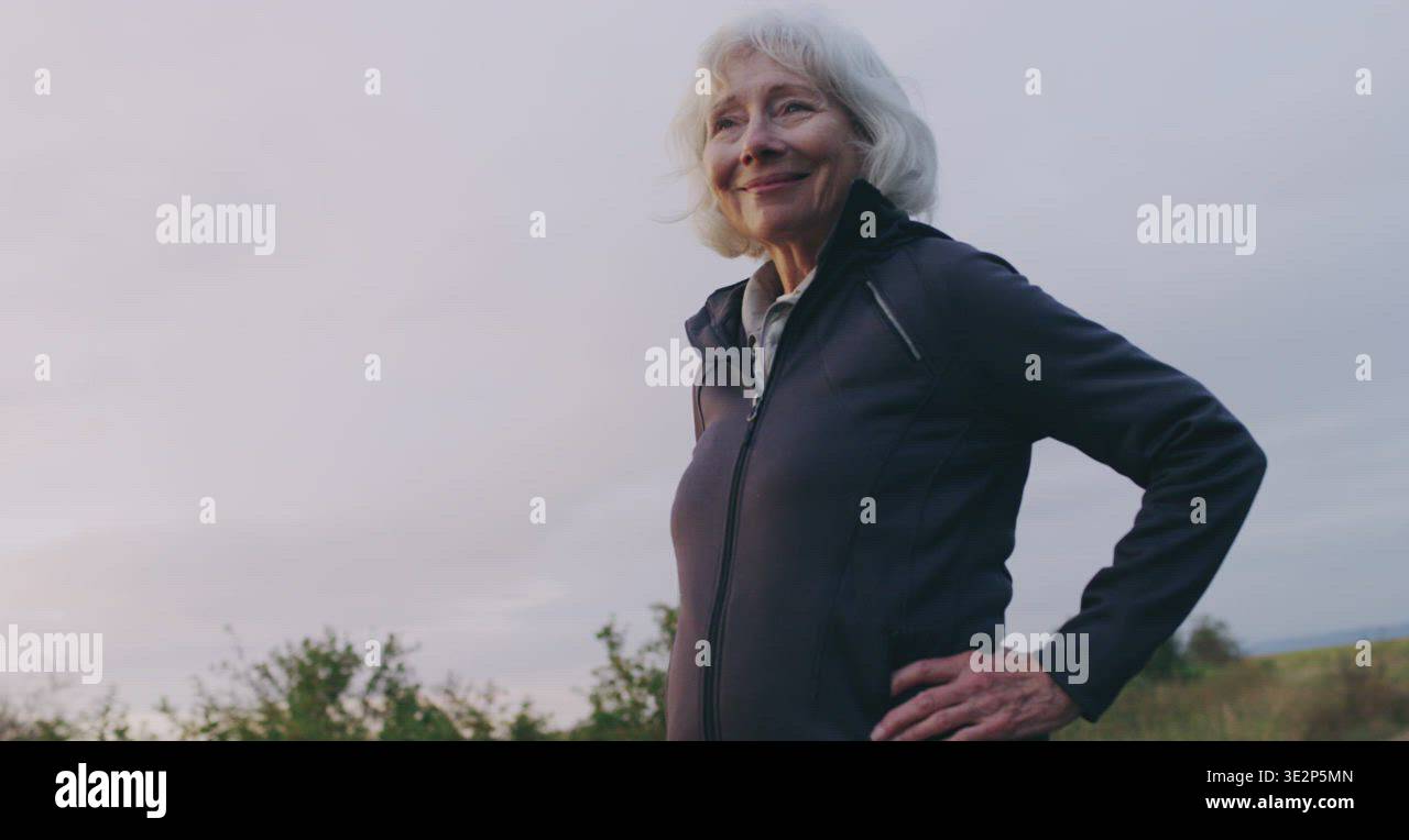 Active, healthy woman looking off into the distance outside Stock Video ...