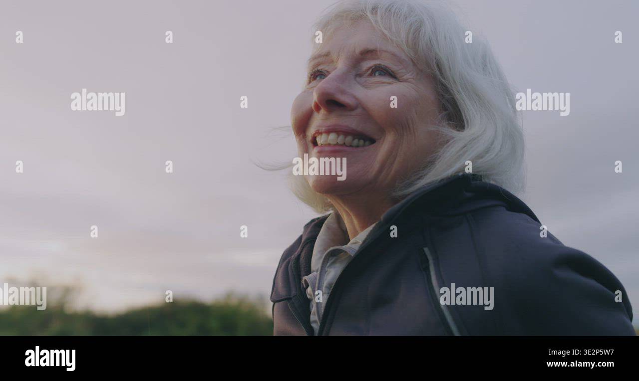 Active, healthy woman looking off into the distance outside Stock Video ...