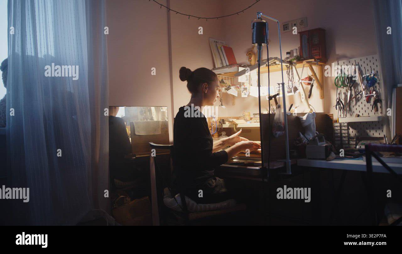 Female goldsmith arranging materials on table Stock Video Footage - Alamy
