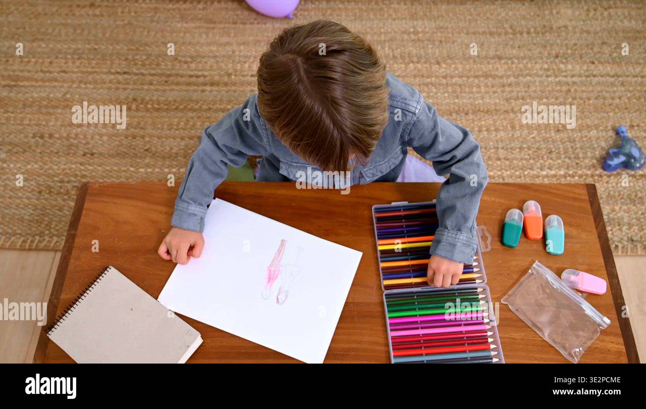 Little Kid Drawing at home Stock Video Footage - Alamy