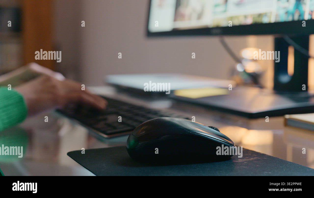 Anonymous scrolling A Mouse and typing on computer Stock Video Footage ...