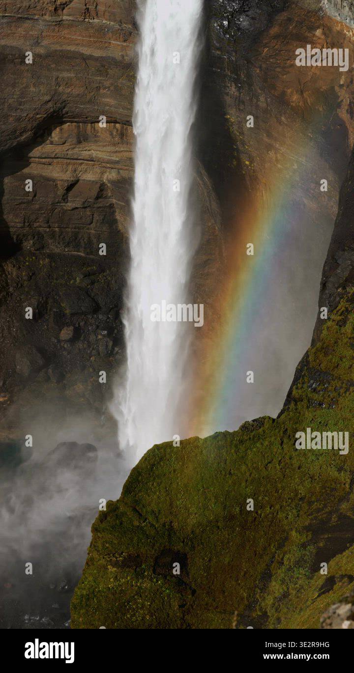 waterfall on cliff and rainbow Stock Video Footage - Alamy