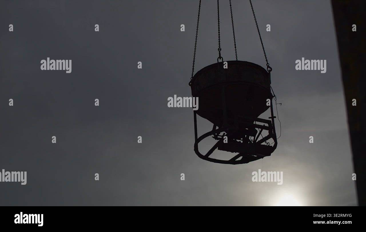 Concrete Bucket is lifting by a Tower Crane Stock Video Footage - Alamy