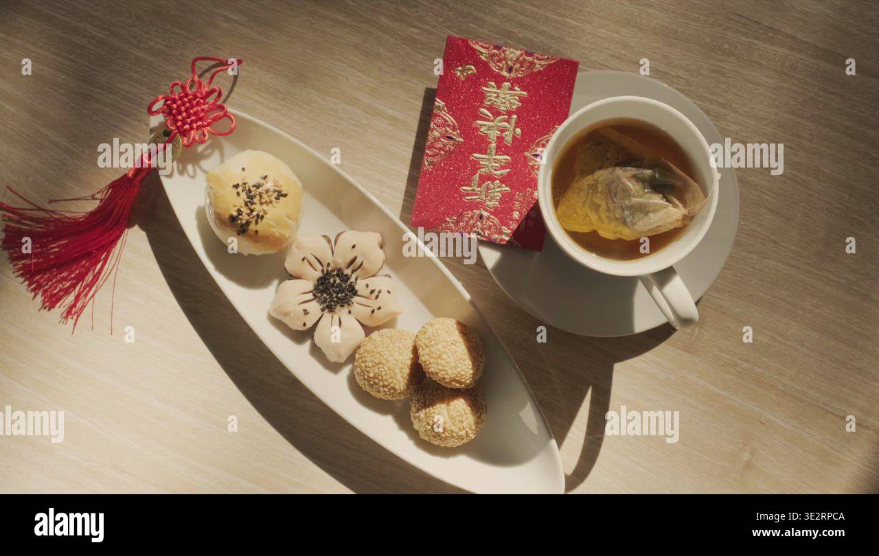 Chinese Pastries and Tea Red Envelope and Lucky Knot Lunar New Year ...