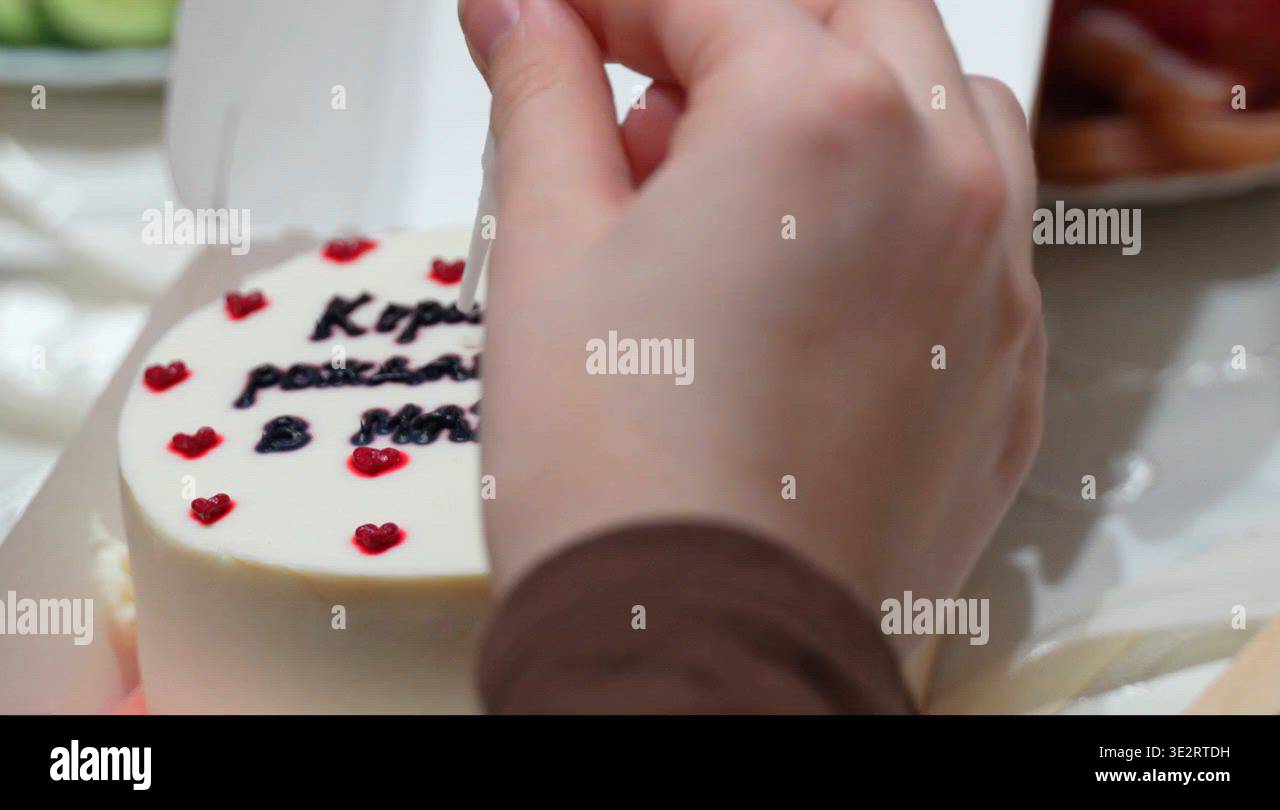 hand of teenage girl puts candle into bento birthday cake Stock Video ...