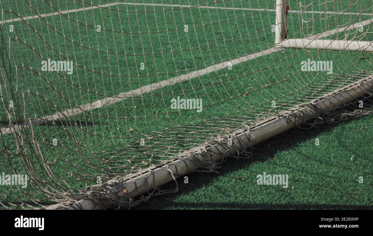 Anonymous football player kicking ball into goal Stock Video Footage ...