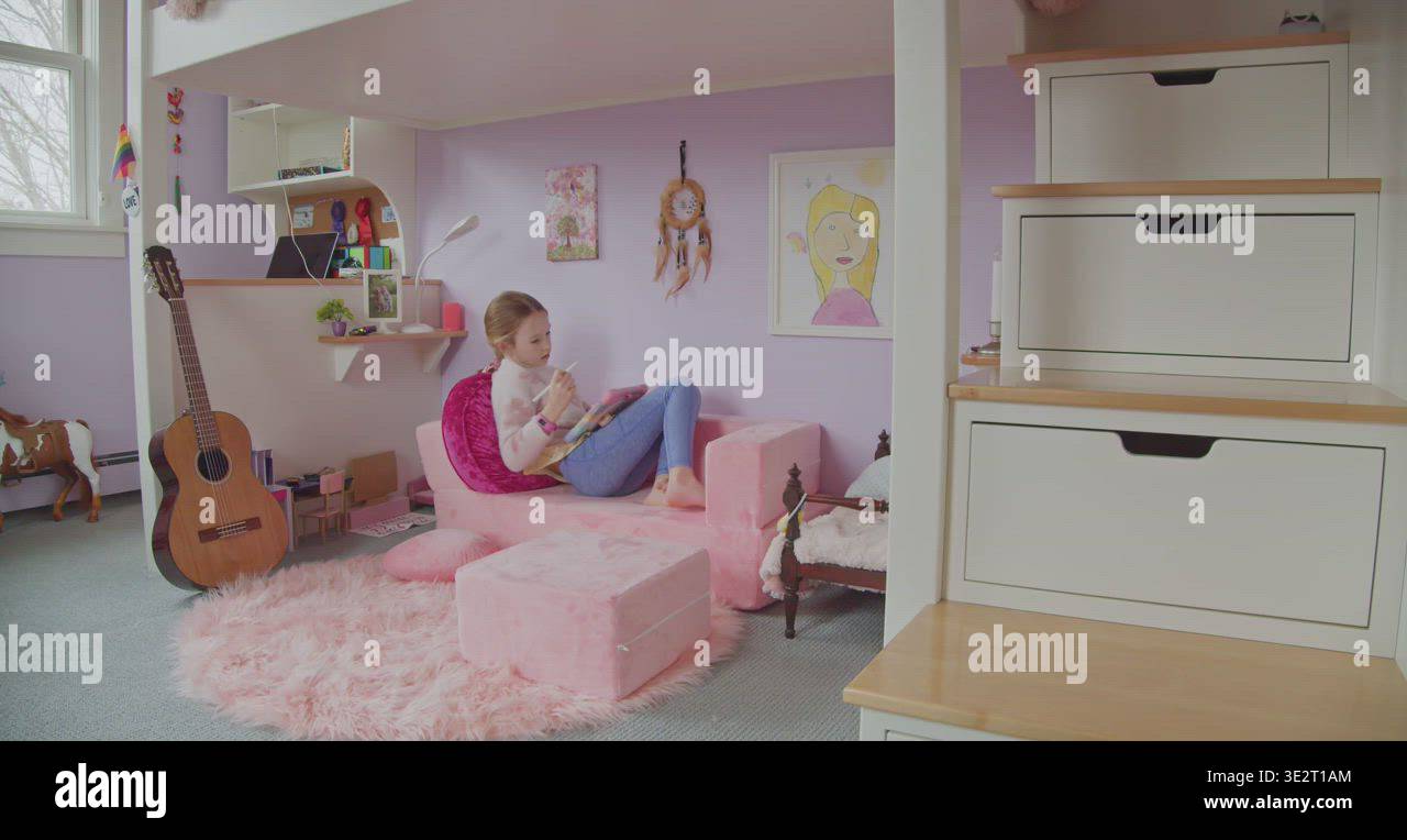Girl Artist in home drawing with stylus pen tablet ipad computer Stock ...