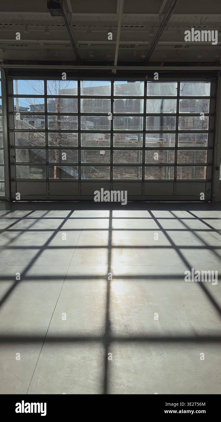 Large window looking out anonymous city urban environment Stock Video ...