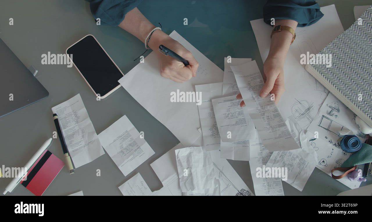 Close-up of Hands Organizing Receipts Stock Video Footage - Alamy